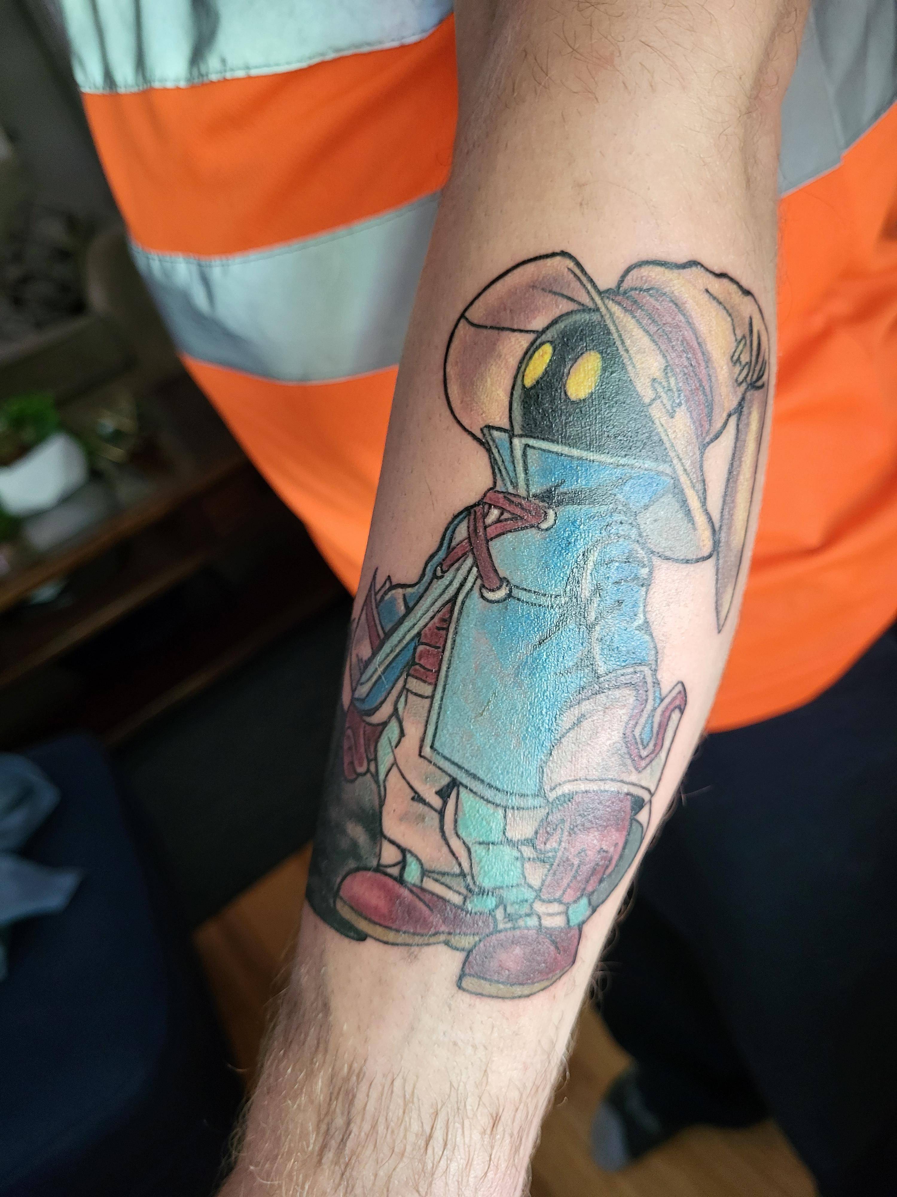 Vivi and my cat who shared his namesake - tattoo in his memory | Scrolller