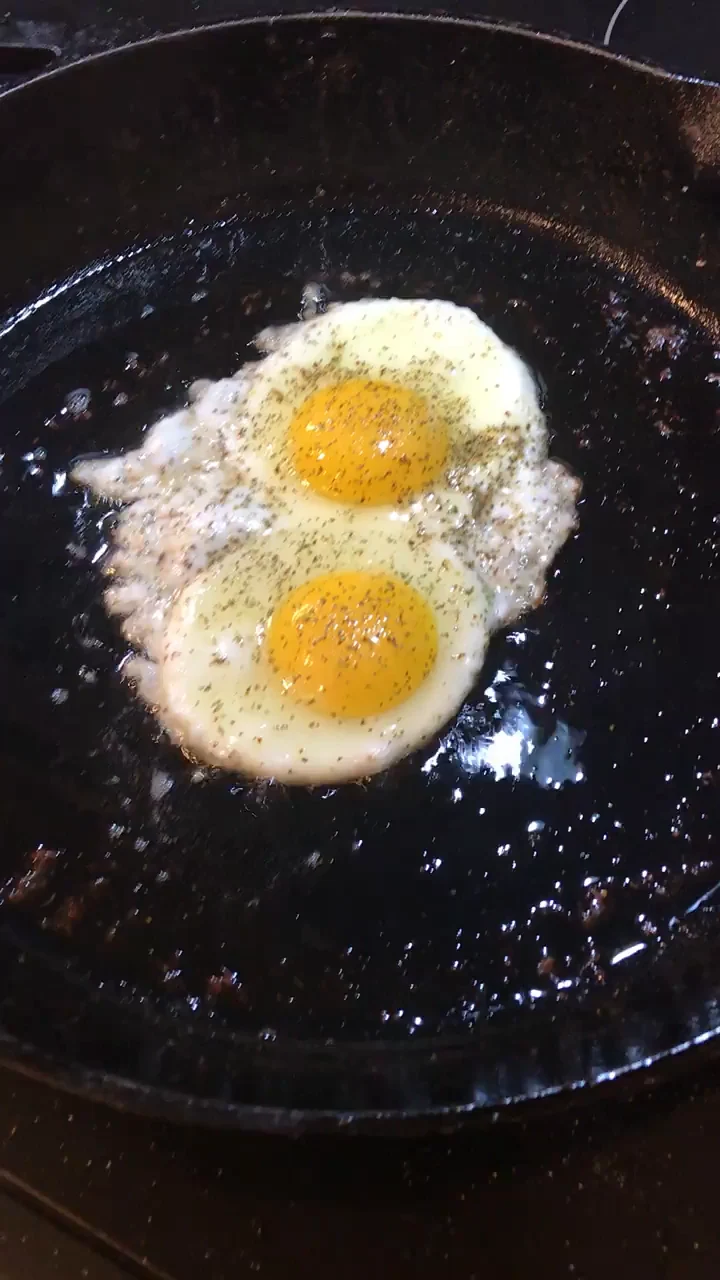 More slidey eggs, but after cooking bacon in the pan | Scrolller