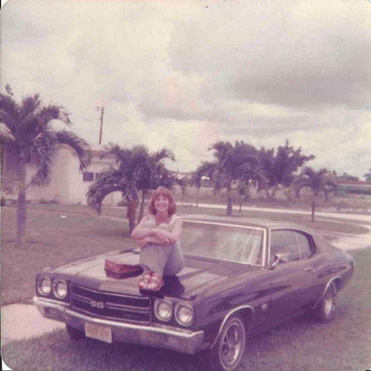 Cute young lady on a 1970 Chevelle SS | Scrolller