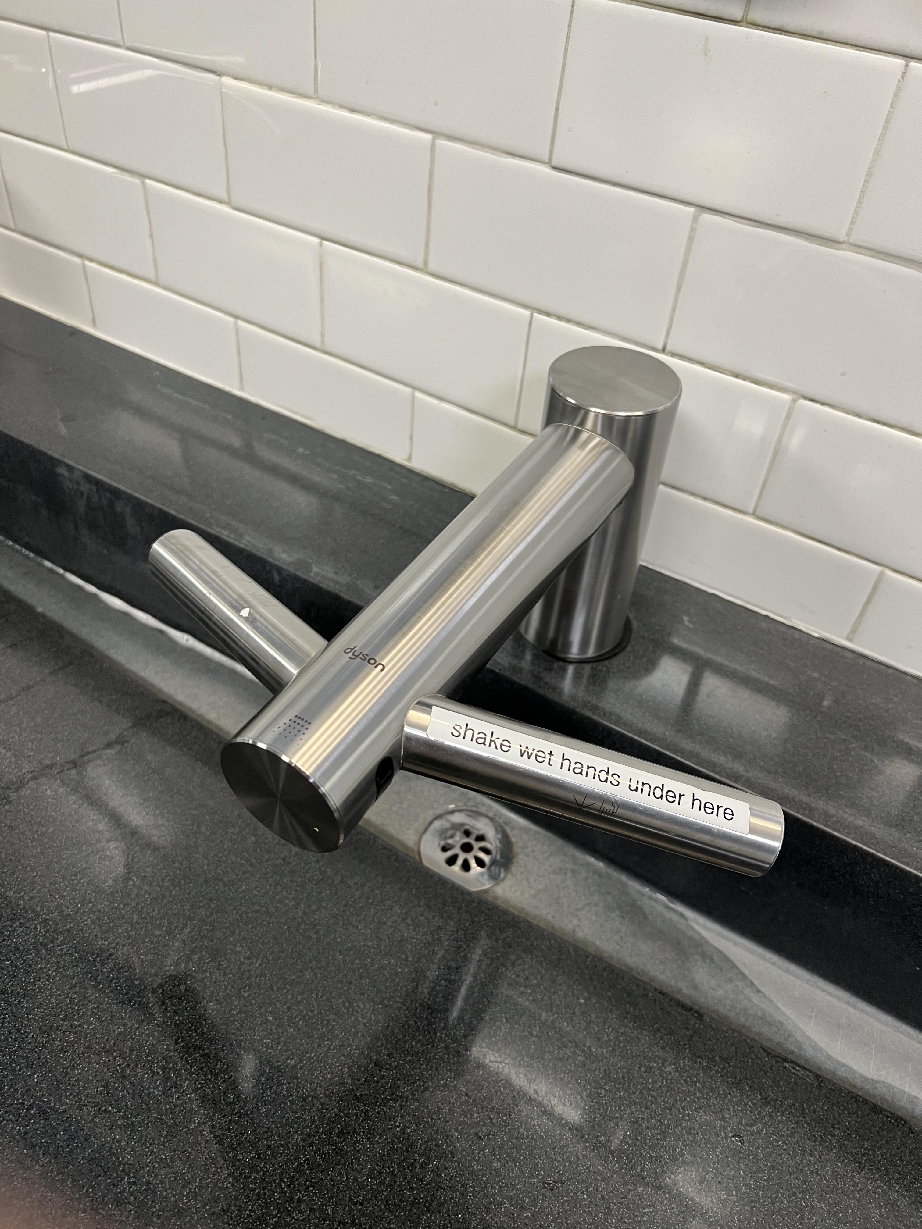 Faucet with integrated hand dryer. | Scrolller