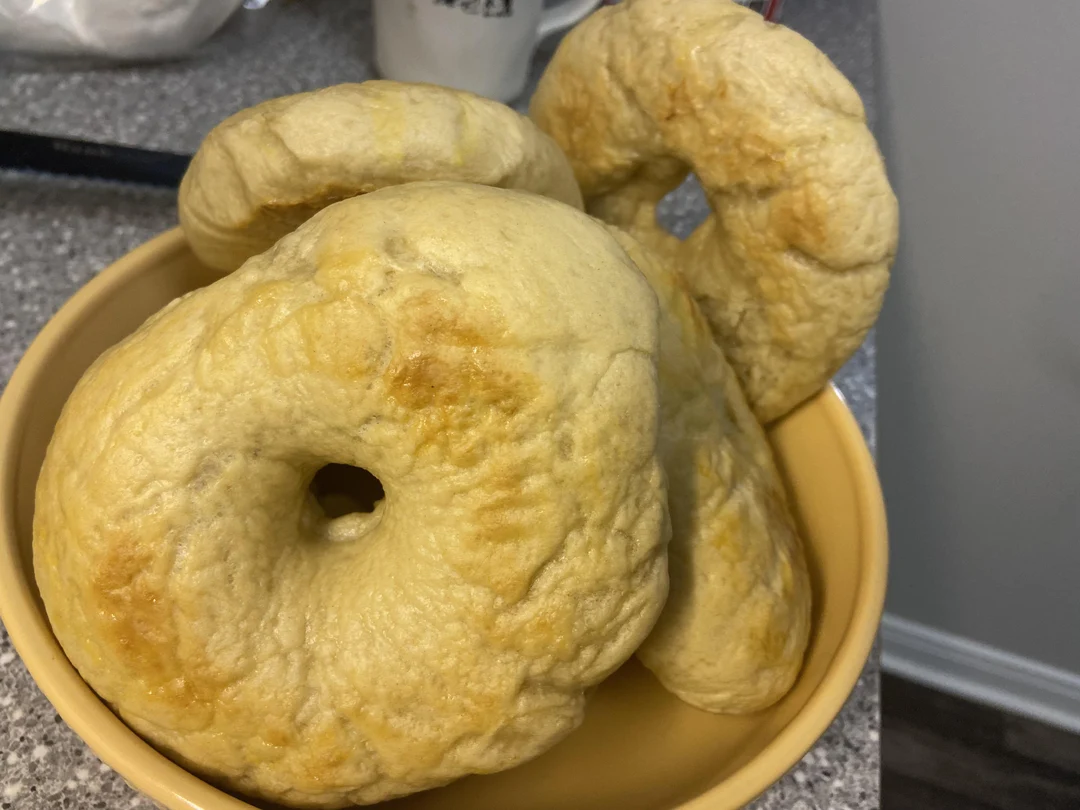 First time making bagels and they cracked all over the top while baking. Any advice? | Scrolller