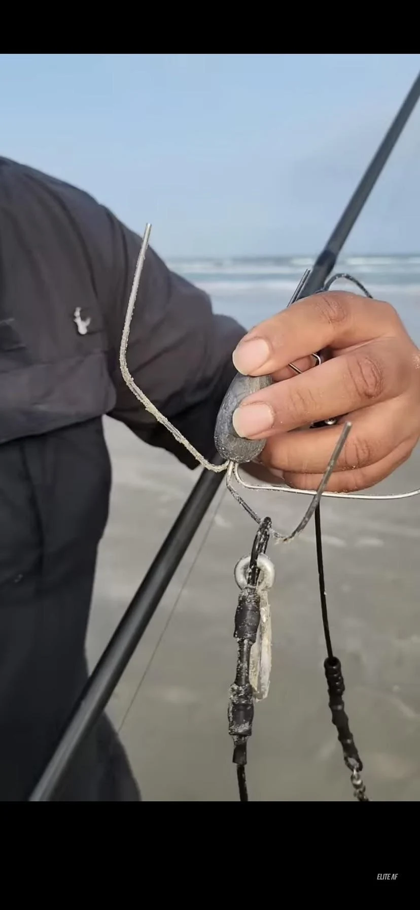 What is the thing the hook is connected to? | Scrolller