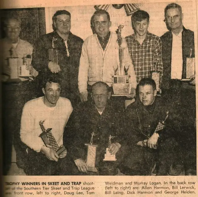 My grandfather (bottom left) in 60's with his shooting trophy. | Scrolller