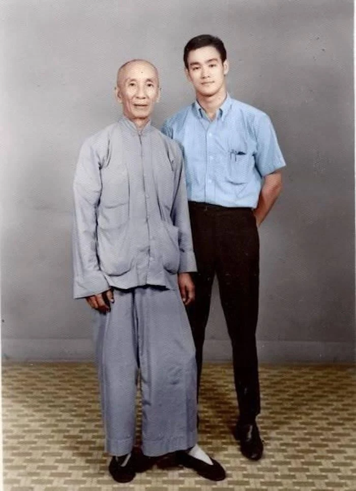 Bruce Lee with his master, Ip Man circa 1960s. | Scrolller