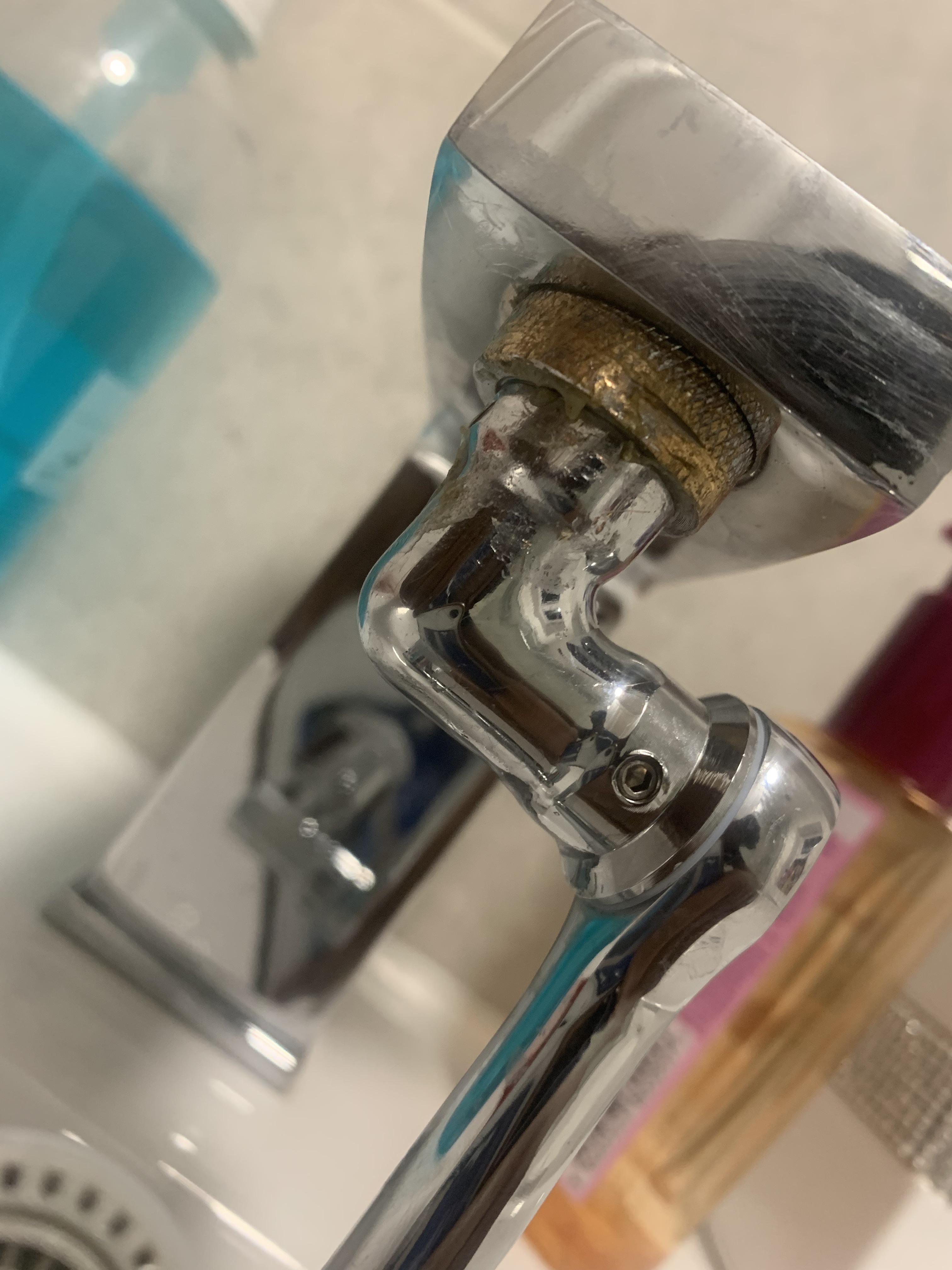 Does anyone know how to unscrew this thing on my tap? i have used all my power yet it won't come ...