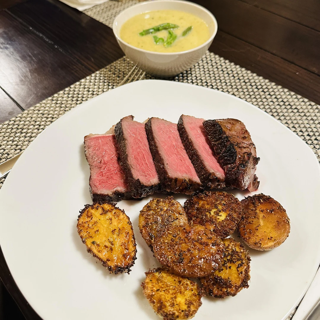 135 Sous Vide Rib Eye with Roasted Potato and Asparagus Soup | Scrolller