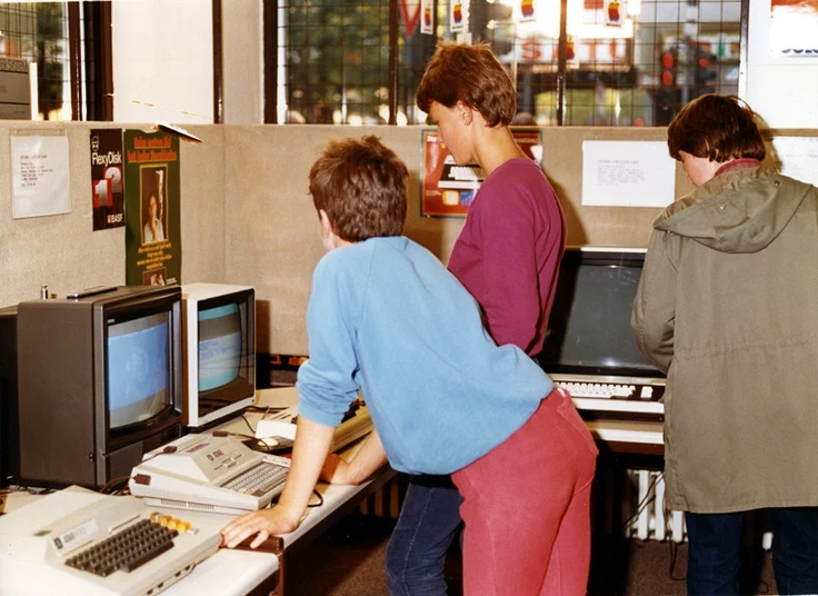 Boys at a computer store in West Germany (1983) | Scrolller