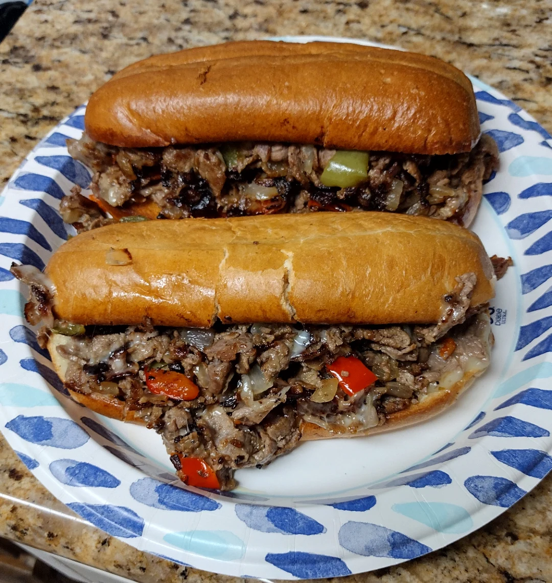 Cheesesteak with Onion, Bell Peppers, and Pepper Jack Chese | Scrolller