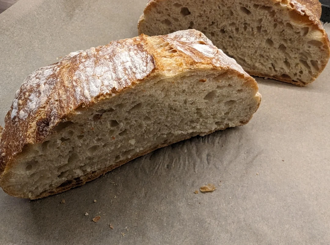 First time baking a bread. Saw a beginner recipe and had to try it. Not perfect, but tasty ...