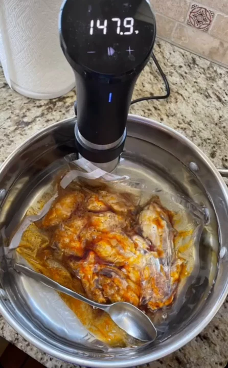 Sous vide chicken wings: 148f 3hrs. Cast iron finish on rocket stove. | Scrolller