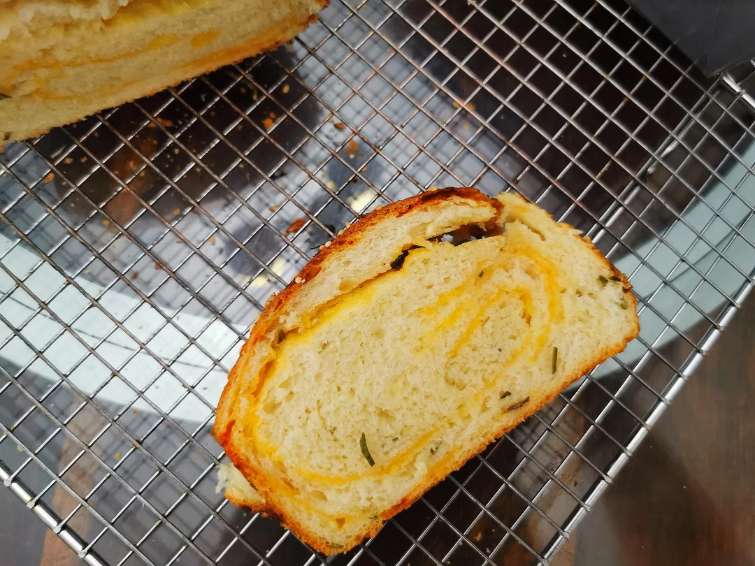 Rosemary garlic cheddar Japanese milk bread. A pat of butter as soon as it's out of the oven ...