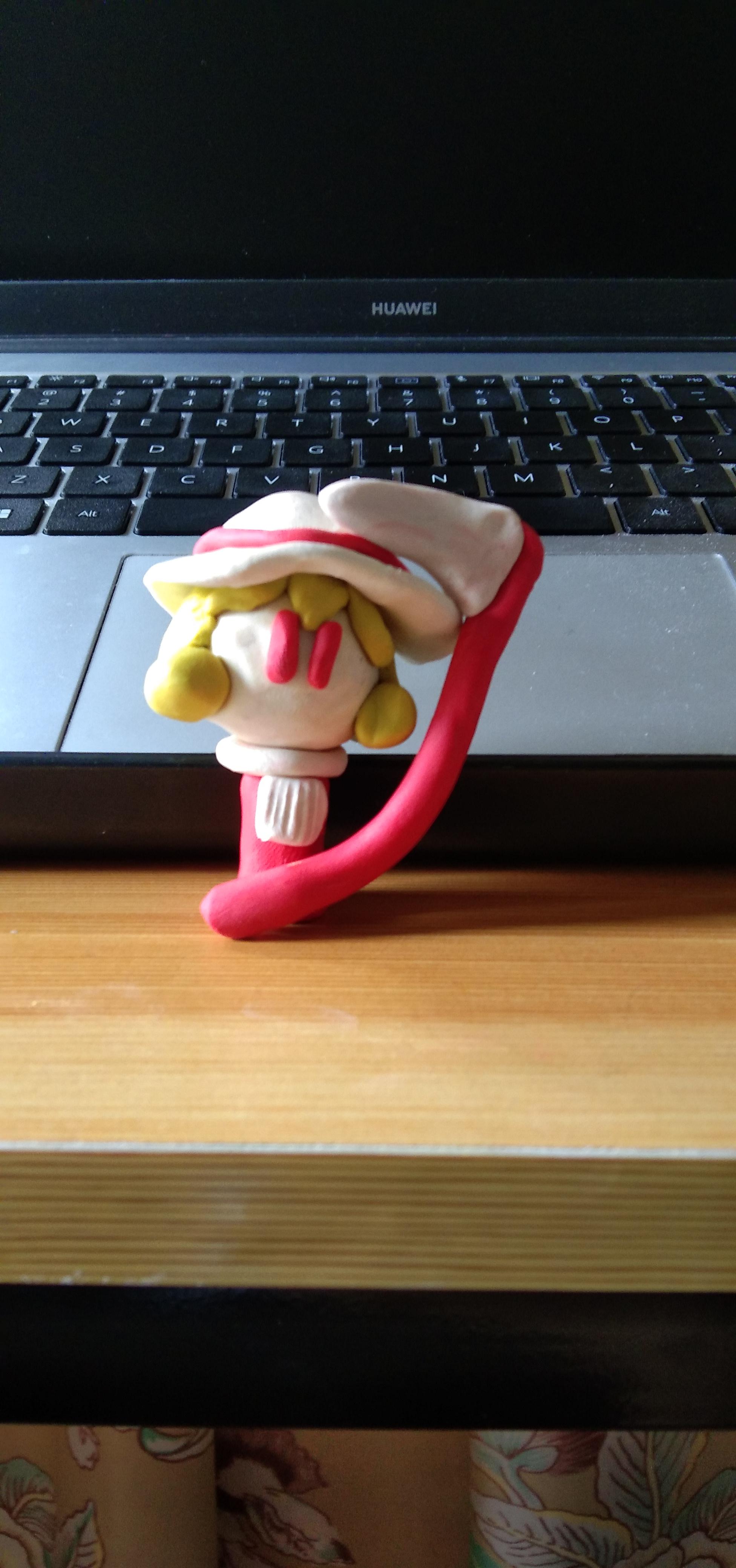 I made elly and her scythe made out of clay. | Scrolller