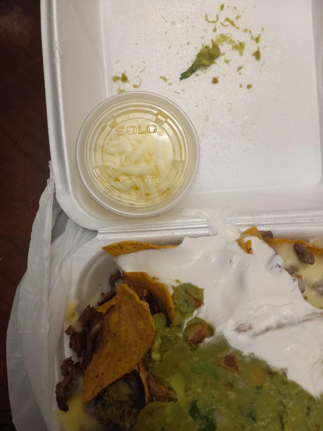 Asked for extra cheese on my nachos. I got shredded cheese in a solo container! | Scrolller