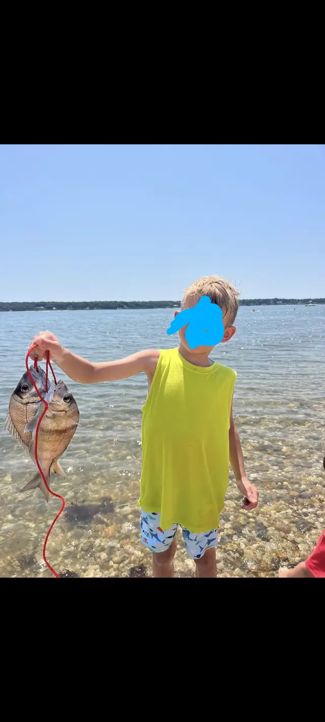 my boy with his first catch | Scrolller