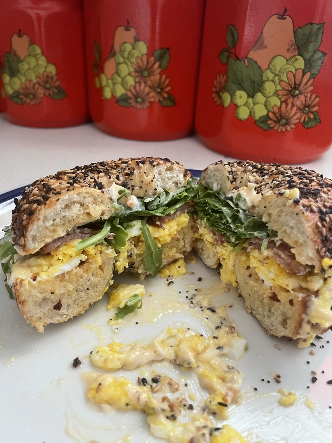 Eggs, bacon, arugula, and chili crisp mayo on an everything bagel | Scrolller