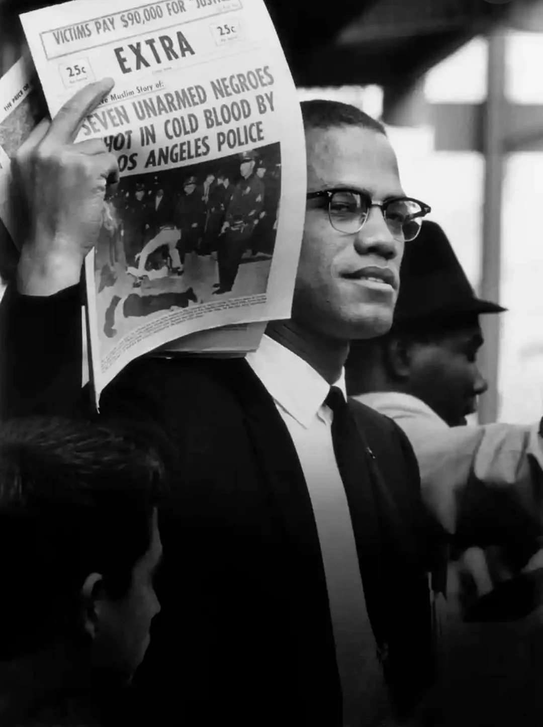 Malcolm X Holding Up Black Muslim Newspaper Circa 1963 | Scrolller