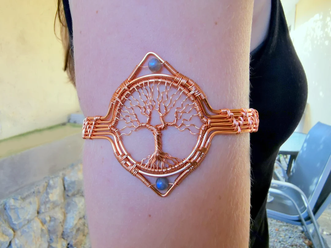 Here's an Yggdrasil armlet I made with ten meters of copper wire. | Scrolller
