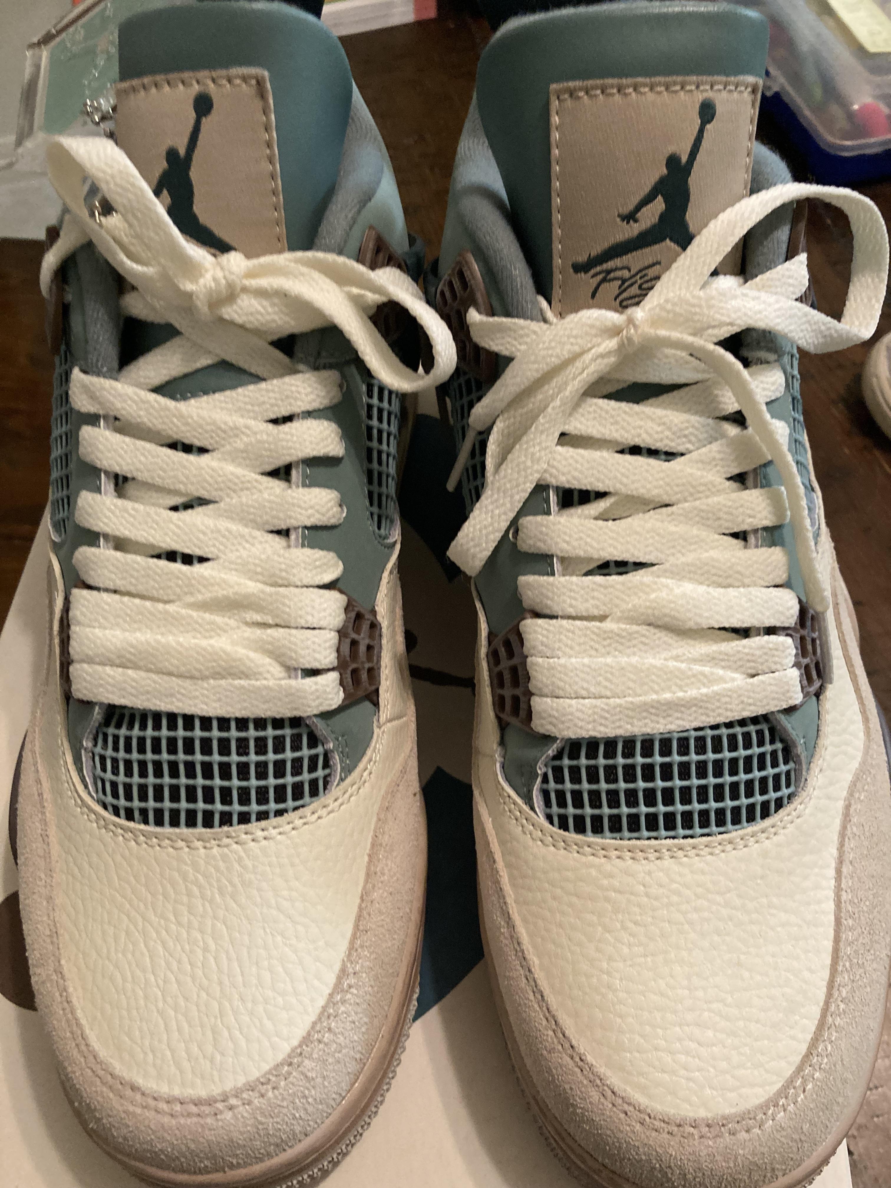 Snorlax Jordan 4 in hand QC | Scrolller