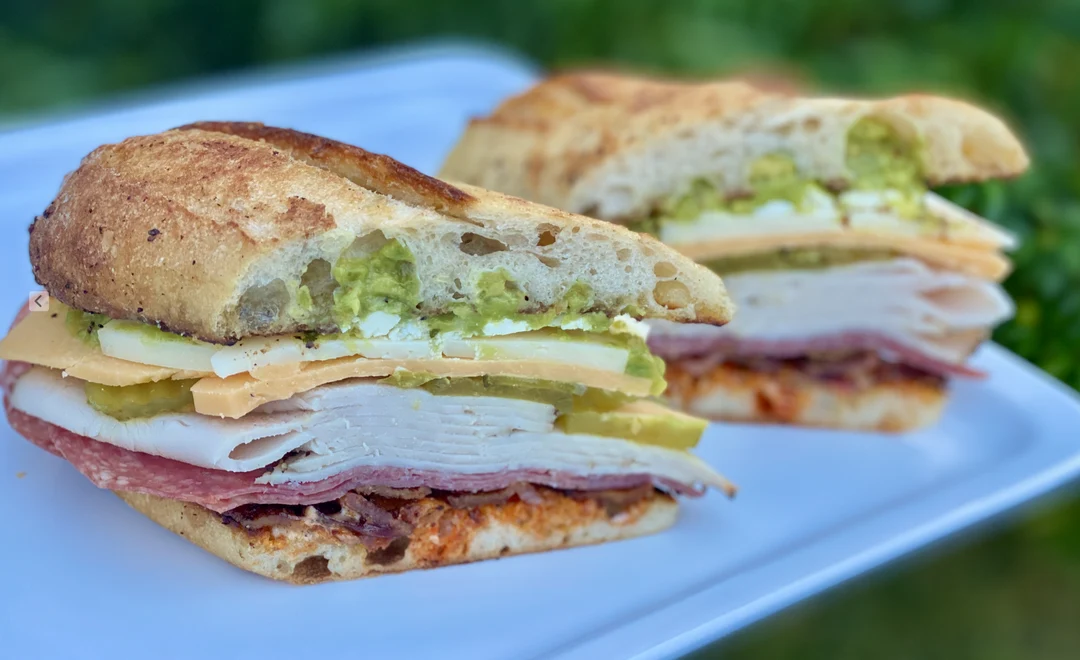 [Homemade] Turkey, Salami, Bacon, Ranch, Calabresian Chiles, Guac, Feta, Sharp Cheddar, some ...