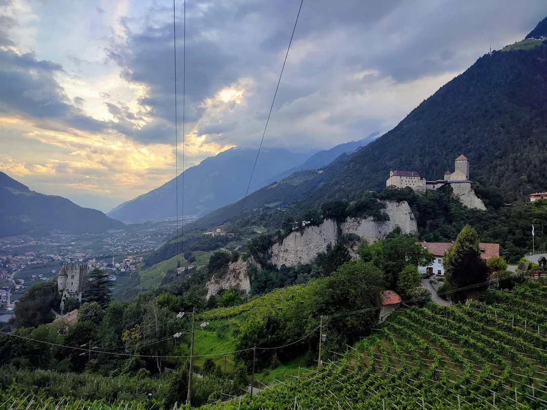 View over Castle Tyrol and Algund - Southern Alps - Italy | Scrolller