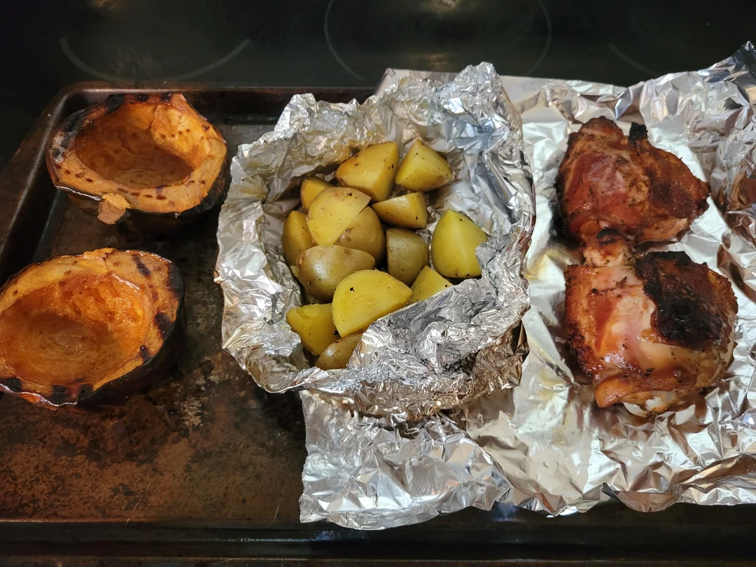 Chx thighs, acorn squash and taters | Scrolller