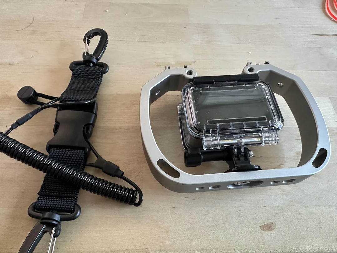 How can i attach camera holder to cord? | Scrolller