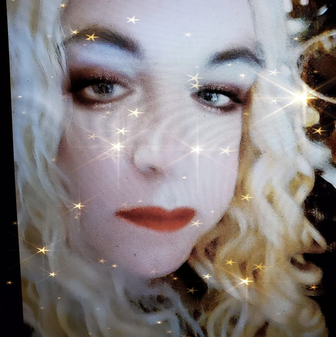 Silver glitter on my face, smear a little round my eyes | Scrolller