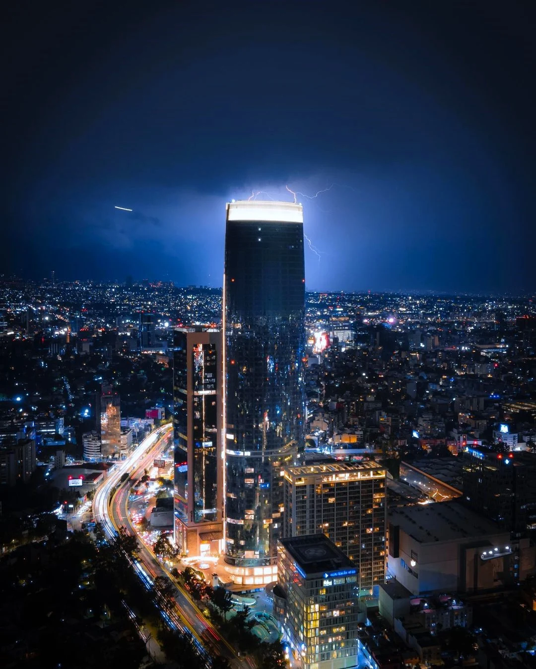 Night in southern Mexico City with its iconic Mítikah tower. | Scrolller