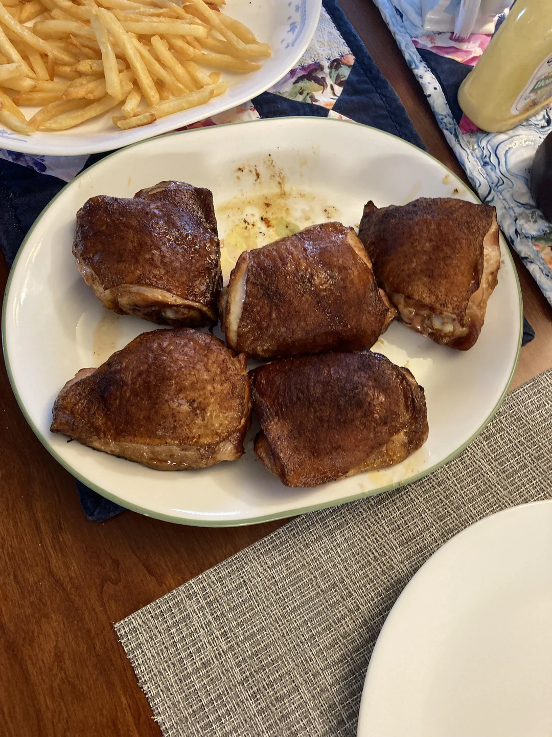 Bone in Chicken Thighs on a charcoal Weber Performer Grill | Scrolller