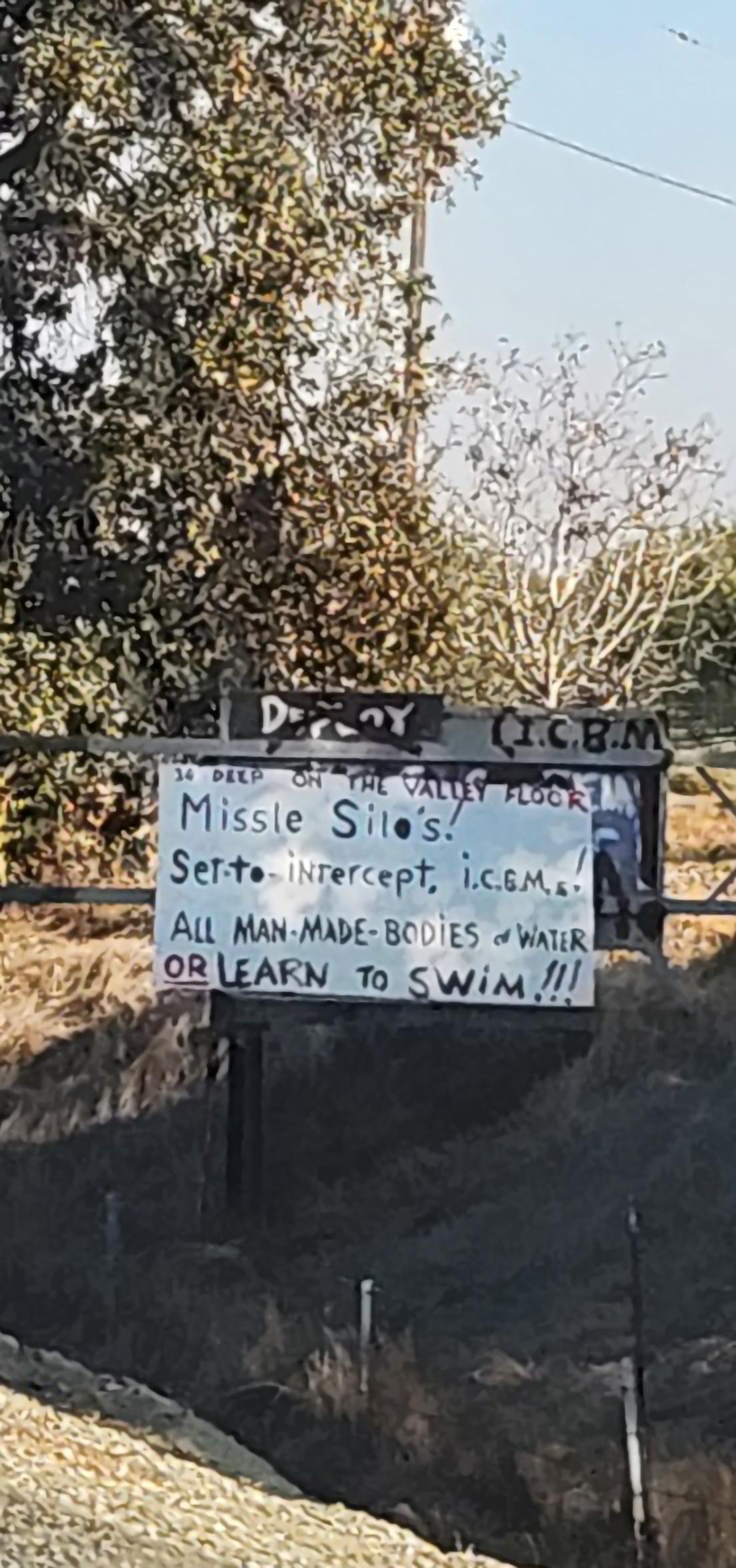 Sign by the side of the highway. | Scrolller
