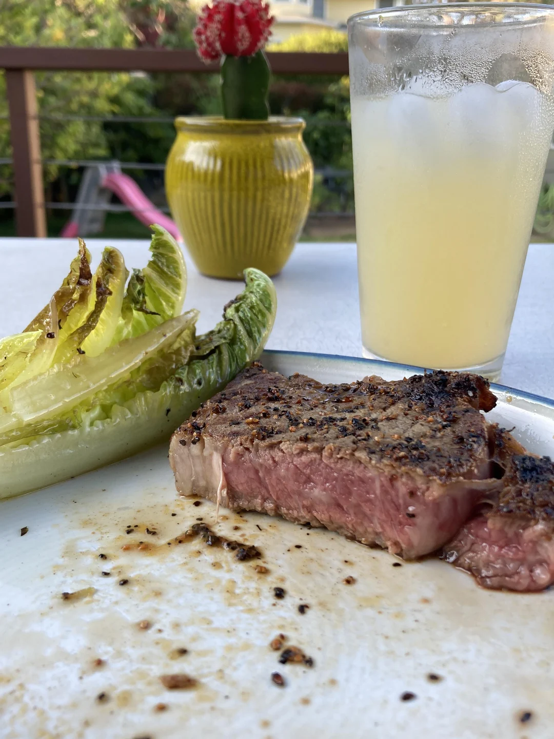 Perfect medium-rare ribeye + grilled romaine lettuce | Scrolller