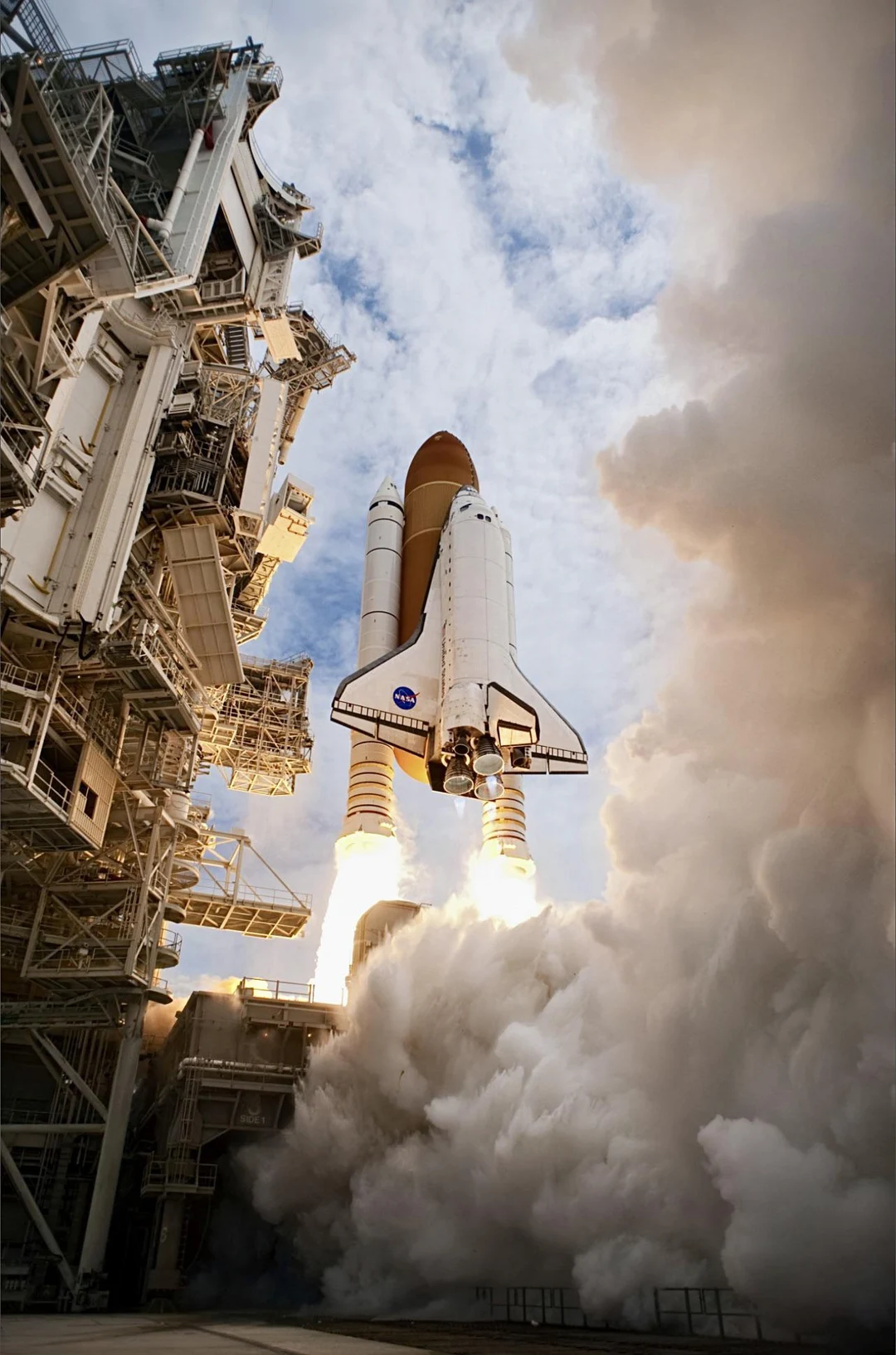 STS-135 Liftoff! The Finale Space Shuttle Mission. Credit: NASA | Scrolller