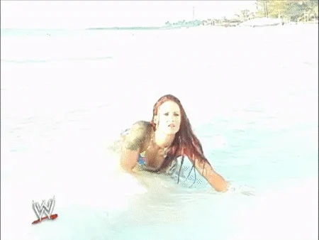 Lita getting wet at the beach | Scrolller