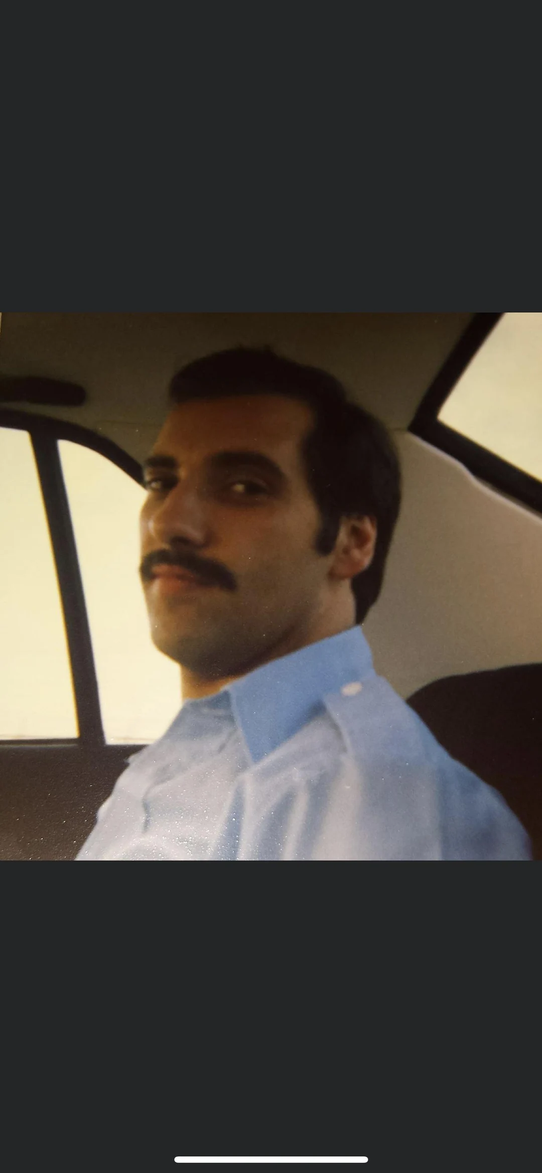 My uncle in the 80s rocking the Freddie Mercury look | Scrolller