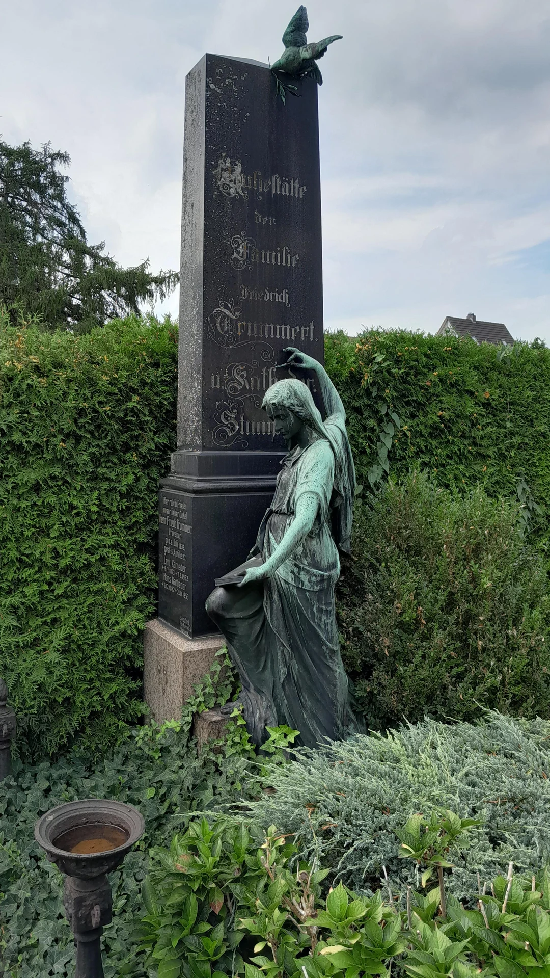 A beautiful bronze statue and black marble obelisk, Germany | Scrolller