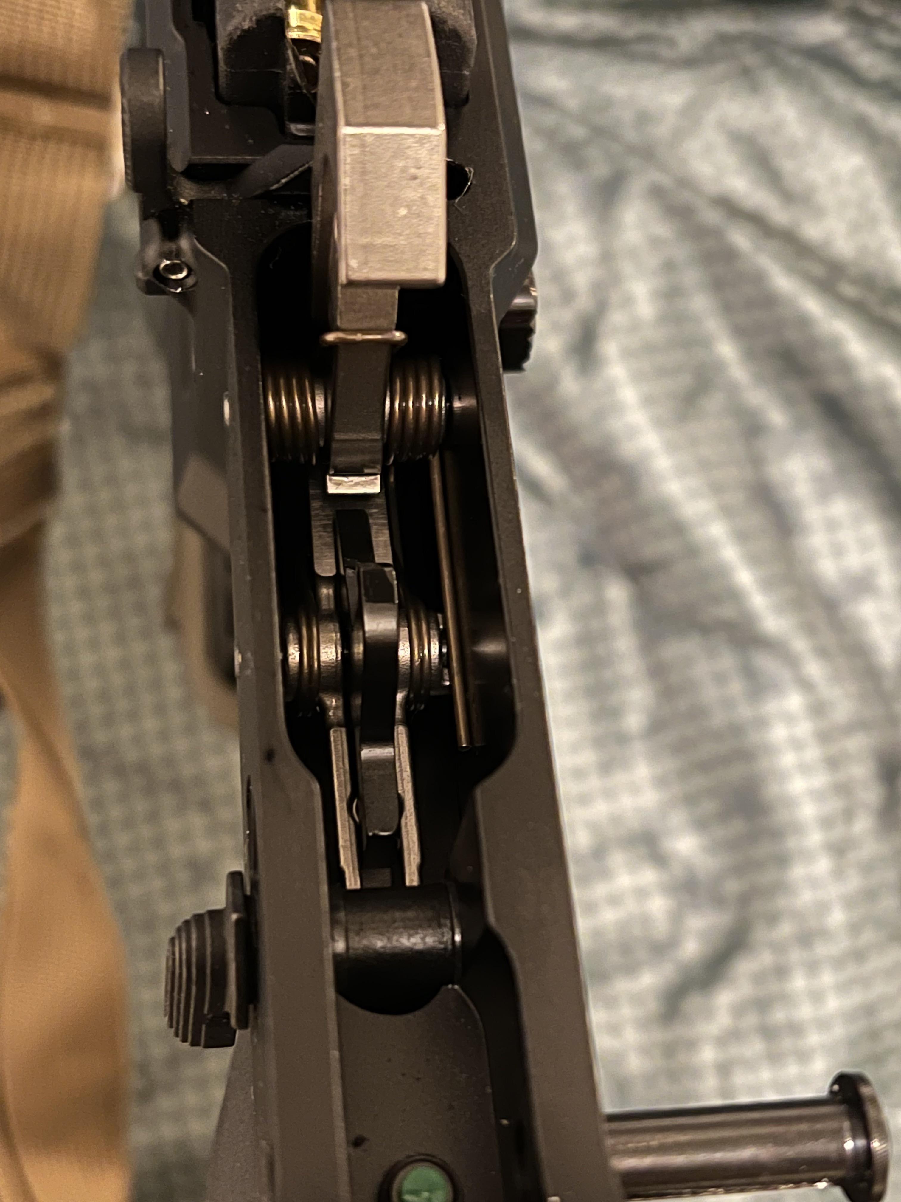 Trigger pins coming loose often. Is this the correct way to install the trigger? | Scrolller