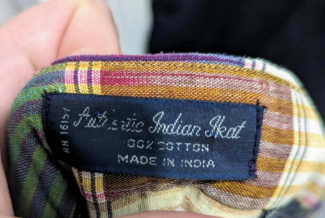 I got a shirt from Goodwill and just noticed the label was worn away. Guess it's perfect for me ...