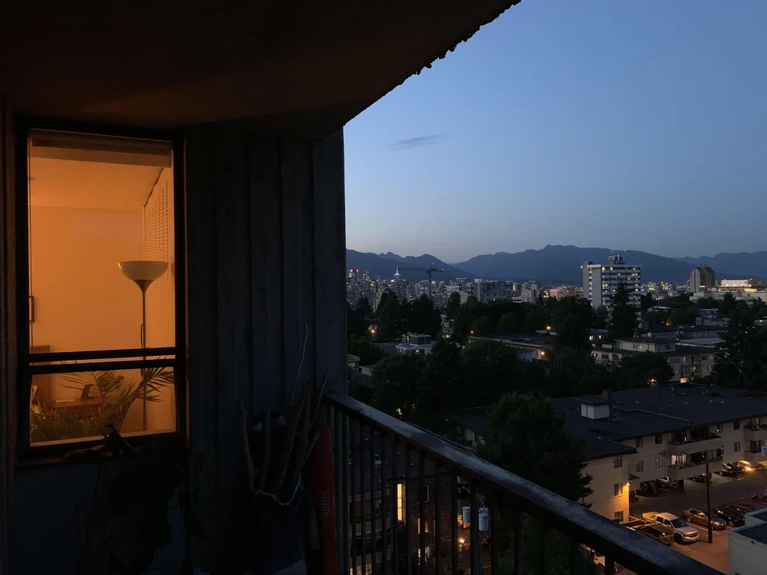 My bedroom window, view from my balcony at dusk. | Scrolller