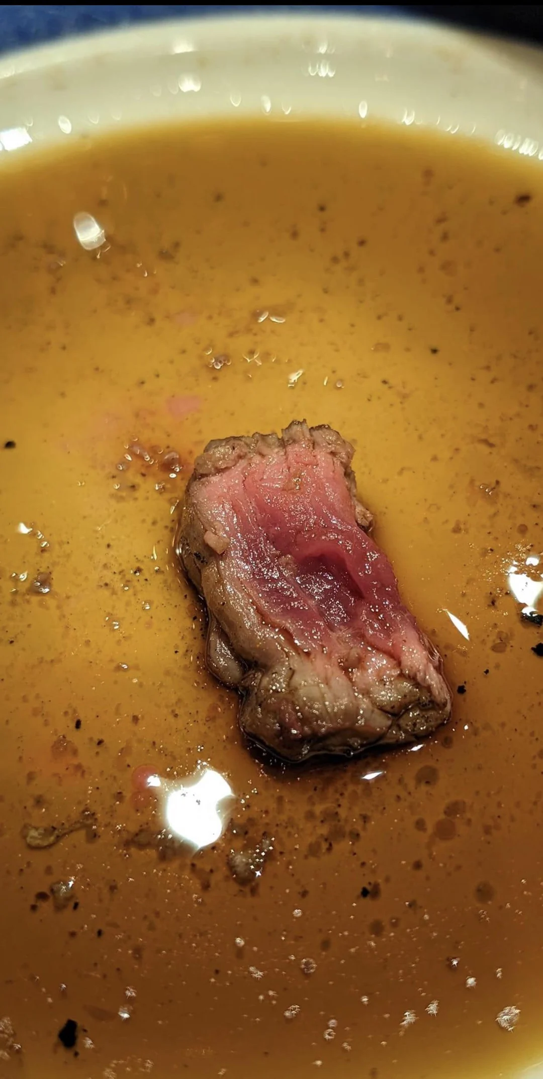 Friend ordered a medium rare filet and got this. They say it’s “perfectly cooked.” What do you ...