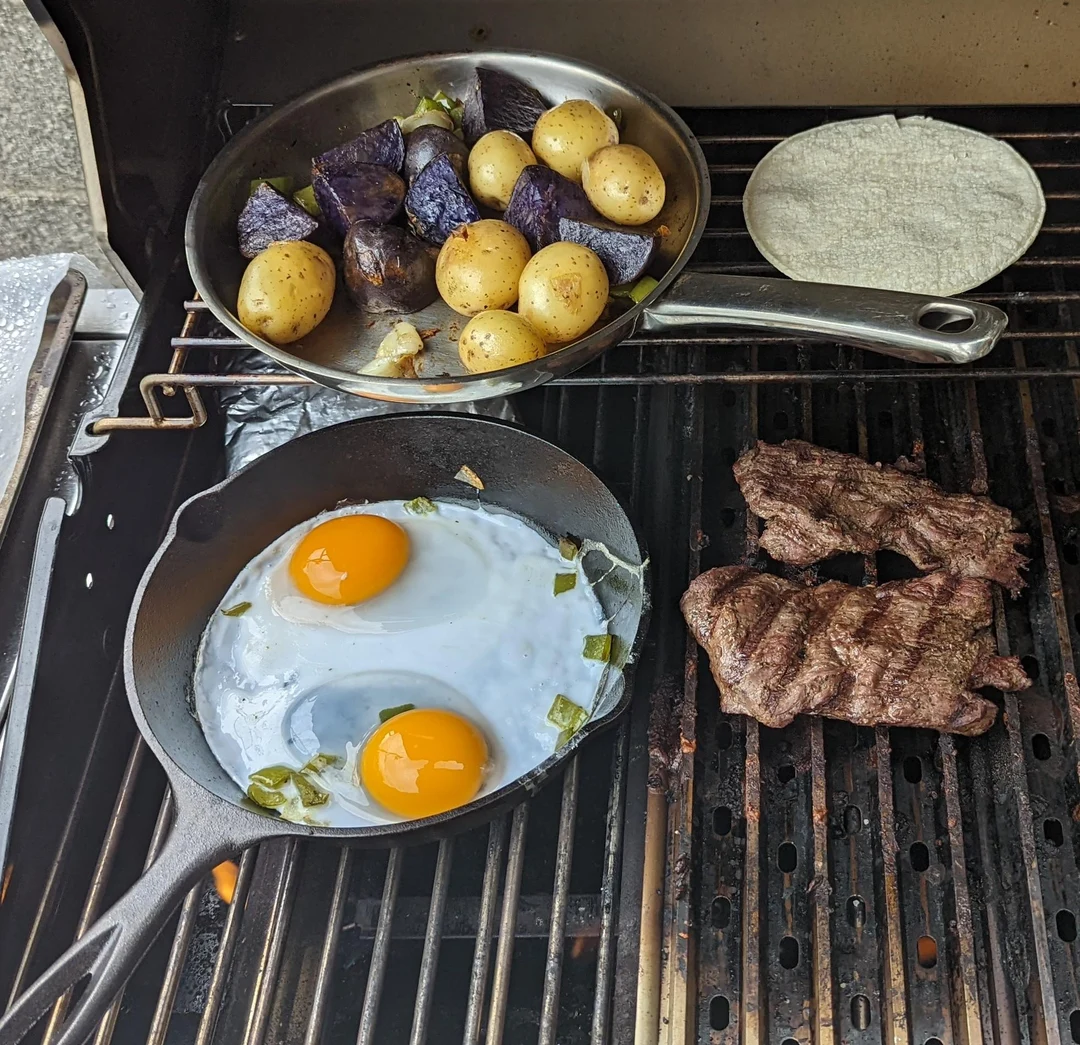 Duck eggs on my little lodge on the grill. They slid right out. | Scrolller