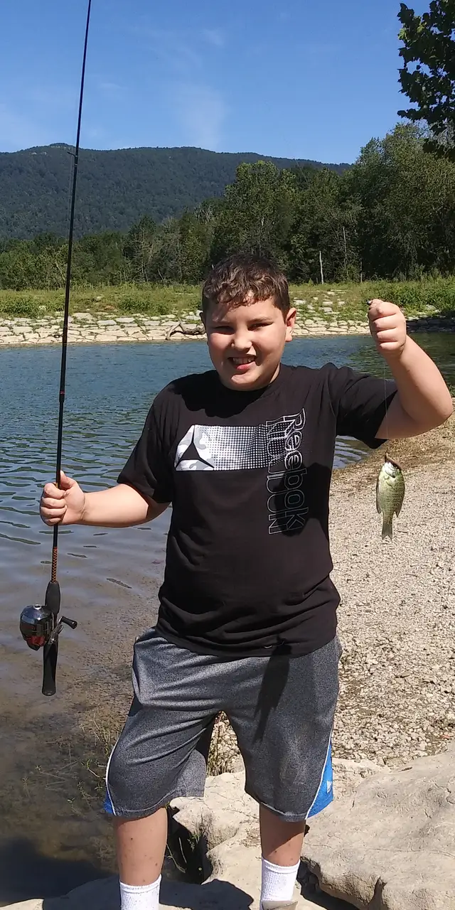 My son's first fish | Scrolller