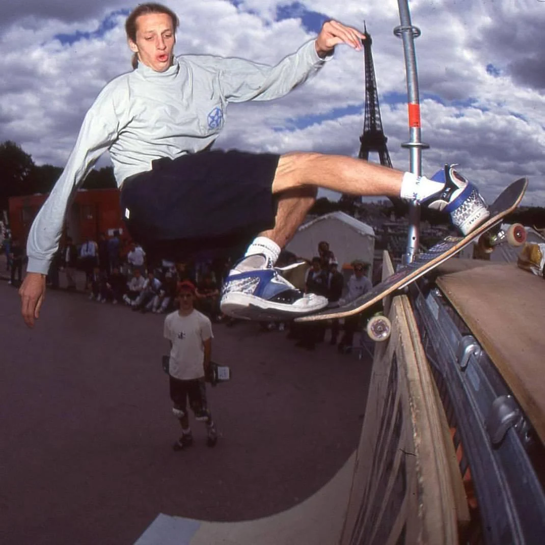 Tony Hawk performing at a skate demo in front of the Eiffel Tower, Paris (1990) | Scrolller