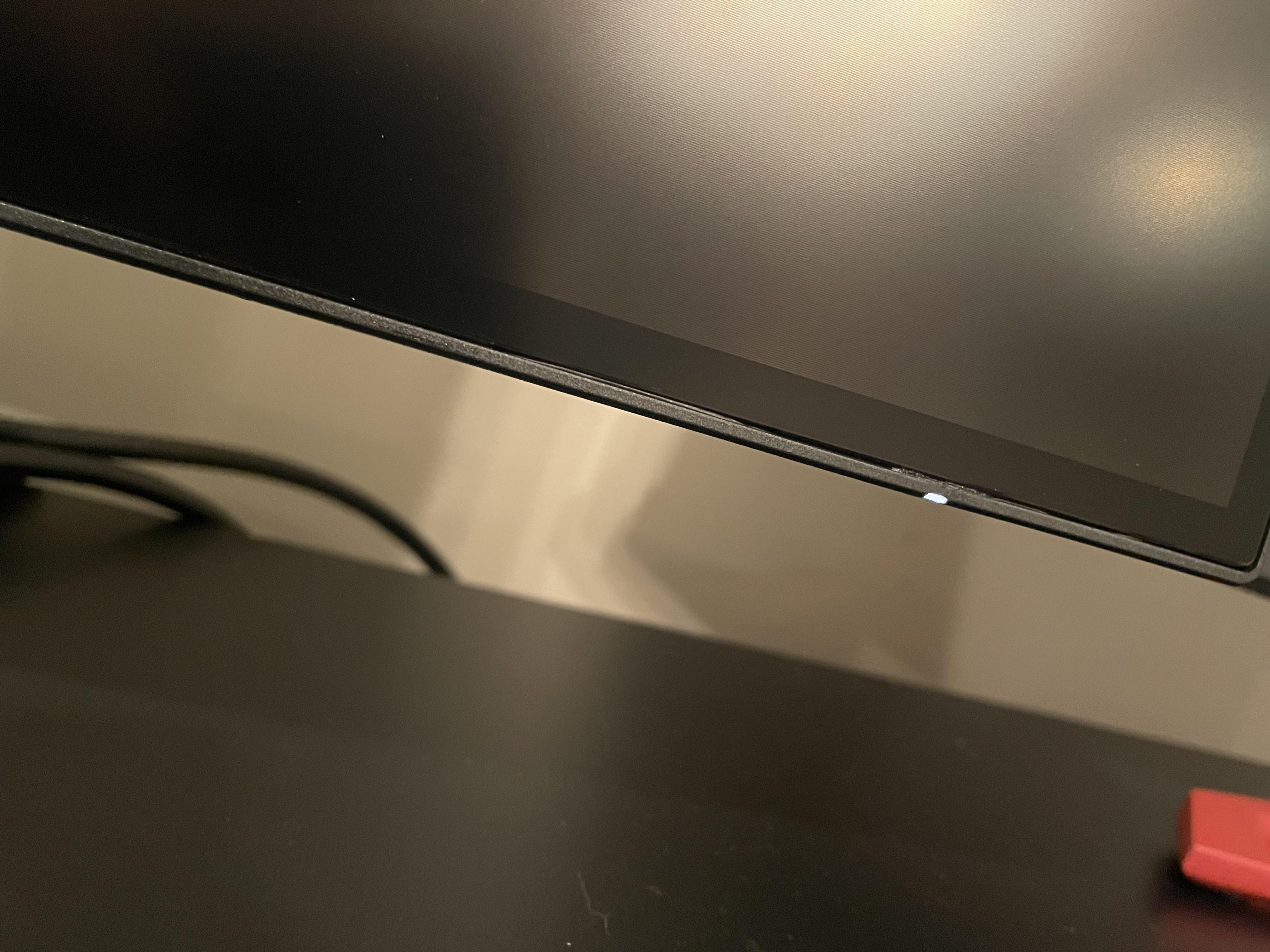 Worth asking for a change if there is gap between monitor frame and bezel, can see wire a bit ...