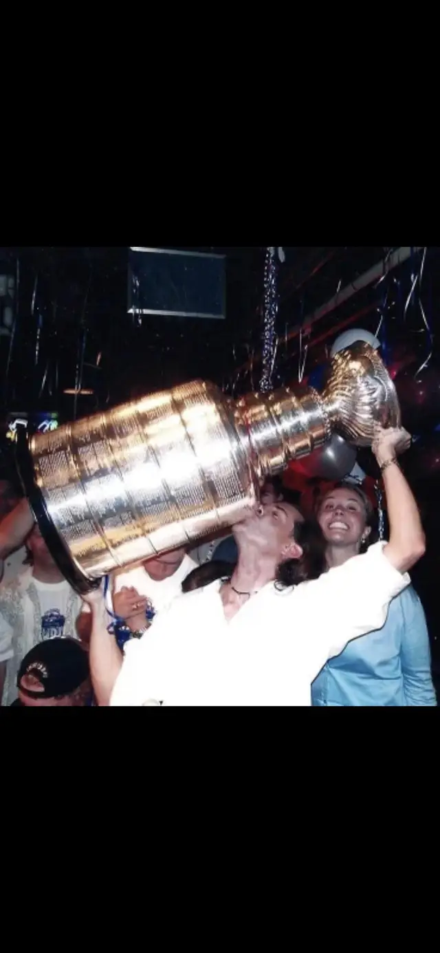My dad holding the Stanley Cup after Colorado Avalanche win (1996) | Scrolller