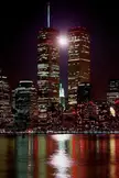 Full Moon between Twin Towers | Scrolller