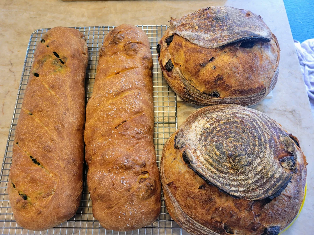 2 sourdough loaves with kalamata olives as well as a spinach loaf and a sausage loaf from this ...