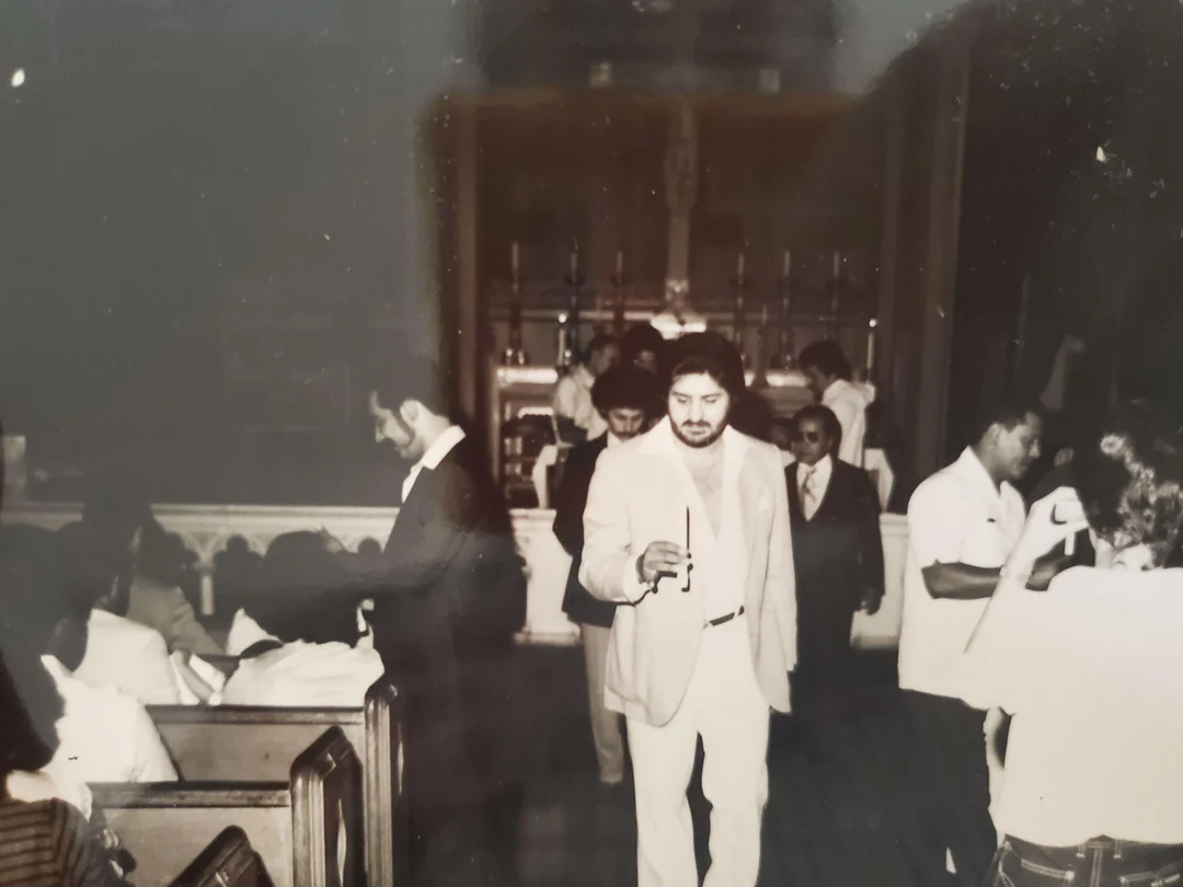 My dad during a baptism in the 70s- NYC | Scrolller
