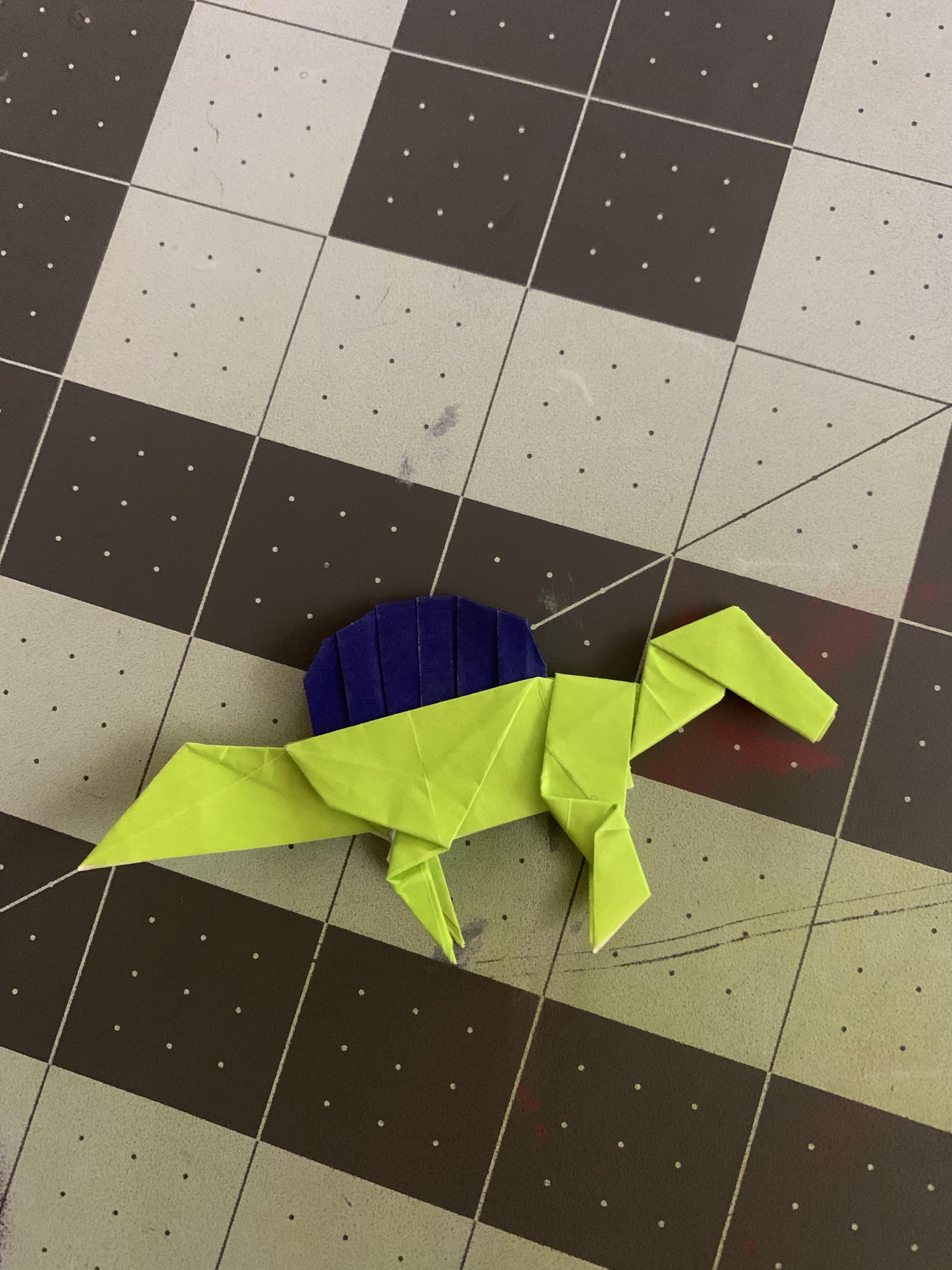 Tiny origami spino I made. What other tiny prehistoric animals should I make? | Scrolller