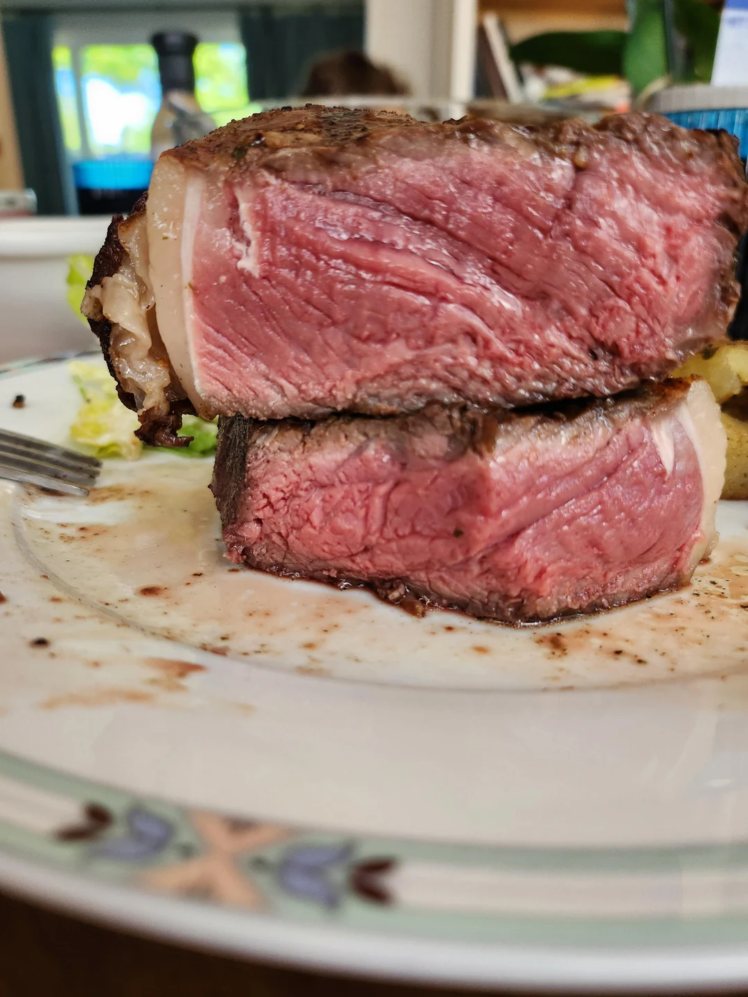 Strip steak on the grill | Scrolller