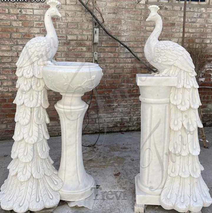 White Peacock Statues | Scrolller